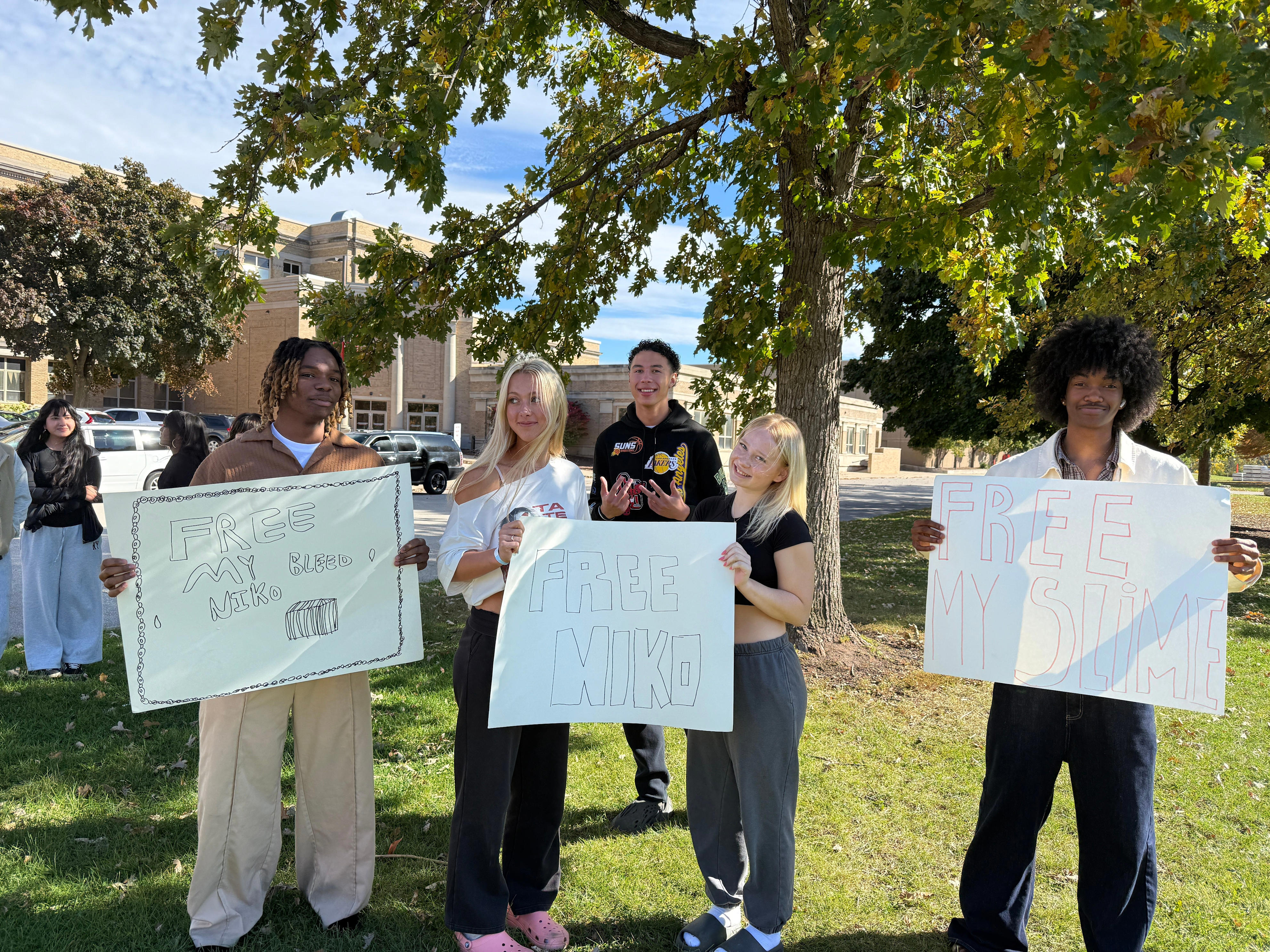 Some Green Bay East students walk out to protest football coach ...