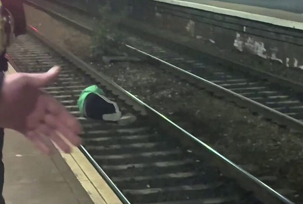 Man ‘takes nap’ on train tracks before police remove him