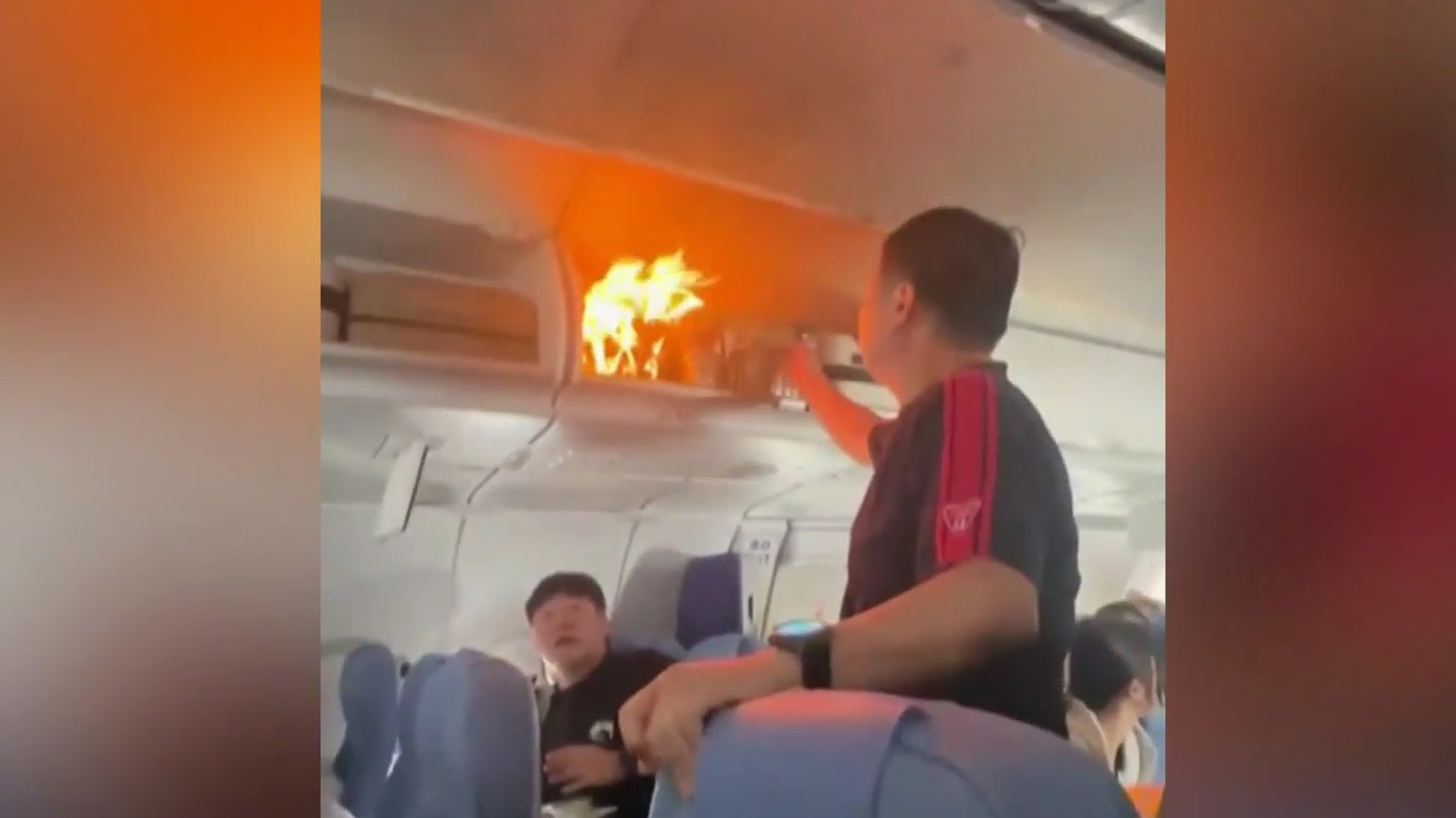 Lithium-ion battery sparks fire in overhead luggage compartment during ...