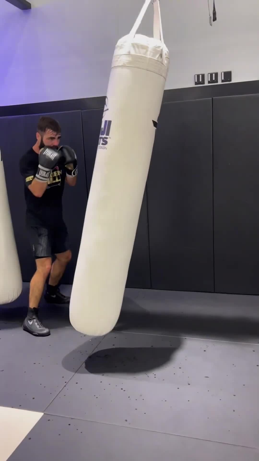 Jono Carroll unloads a full barrage of punches on the heavy bag workout