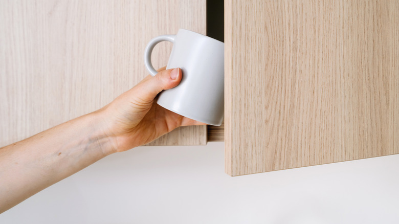 Clear Cabinet Space With A Simple Sliding Storage Solution For Coffee ...