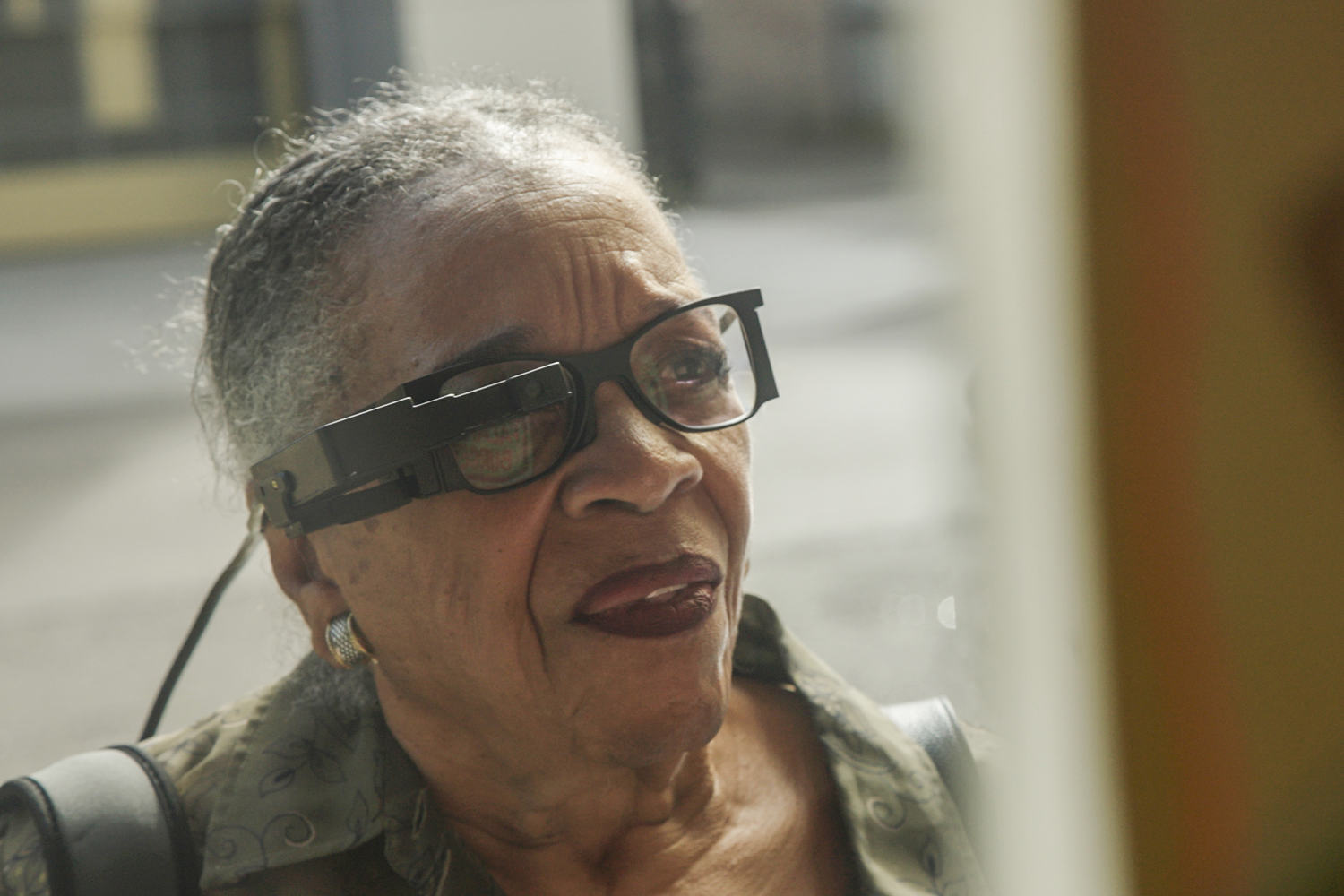 With a tiny eye implant and special glasses, some legally blind ...