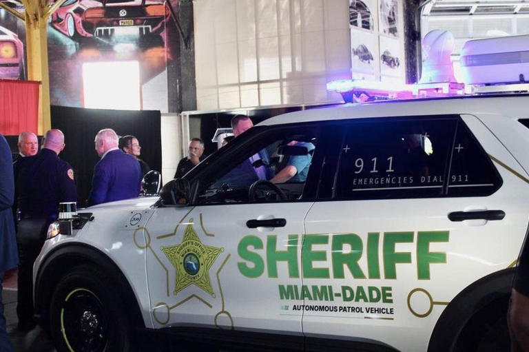 US police unveil real-life RoboCop car that drives itself and launches ...