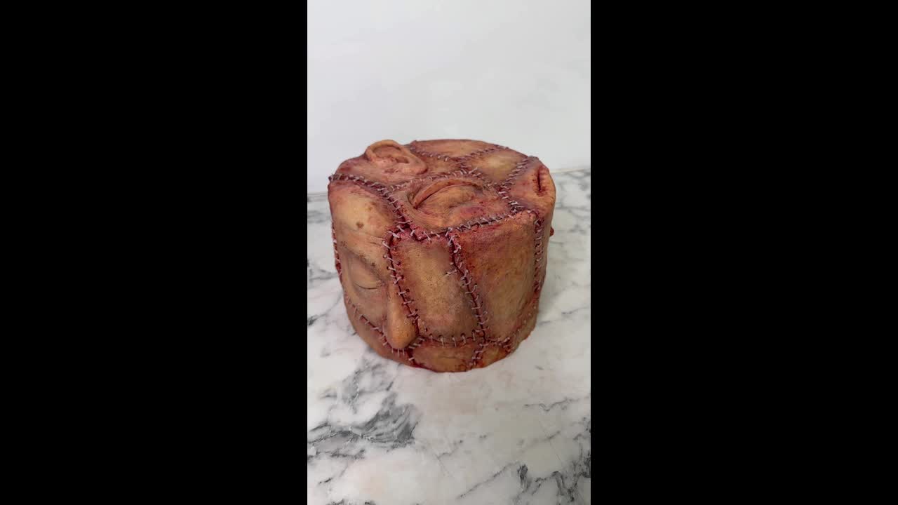 Baker's 'disgusting' human body part cake looks like something Ed Gein ...