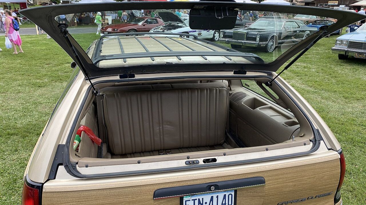 Why some cars had rear-facing back seats