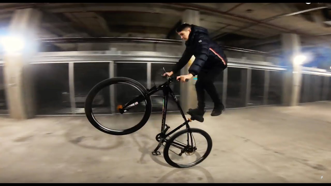 Wheelie session in an underground carpark
