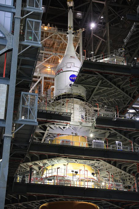 NASA stacks Artemis 2 moon mission's Orion capsule atop SLS rocket ...