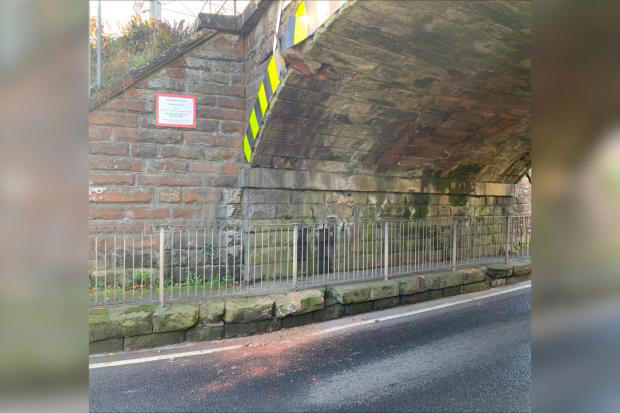 Woman allegedly held over bridge and threatened with being killed