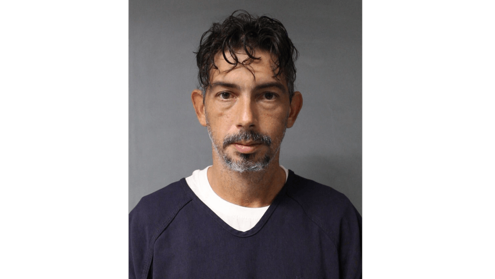 Man sentenced for strangling roommate to death before fleeing country