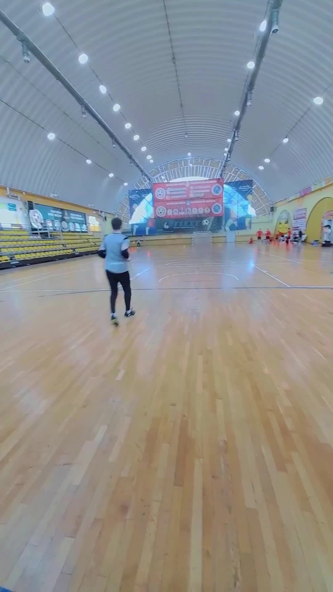 Intensive Goalkeeper Training Session in Indoor Sports Arena