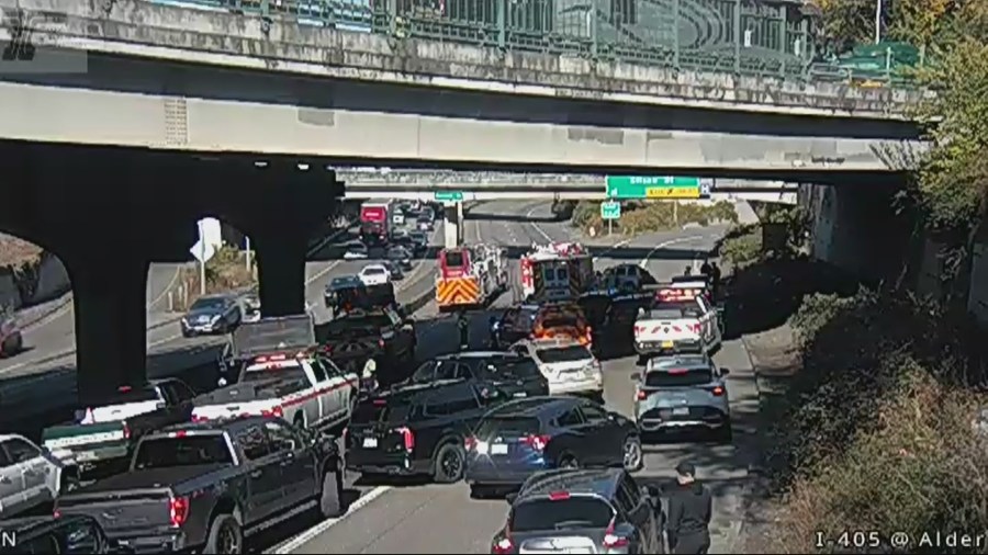 I-405 crash briefly closes off-ramp lane, hospitalizes driver