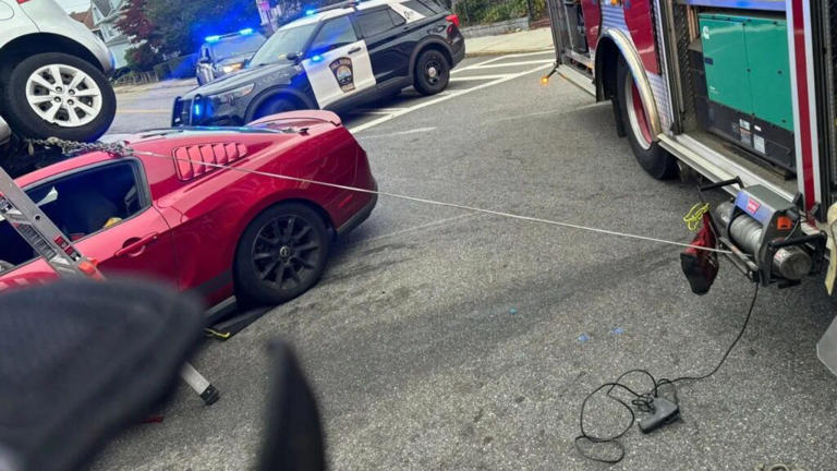 Crash Stacks Kia on Top of Ford Mustang