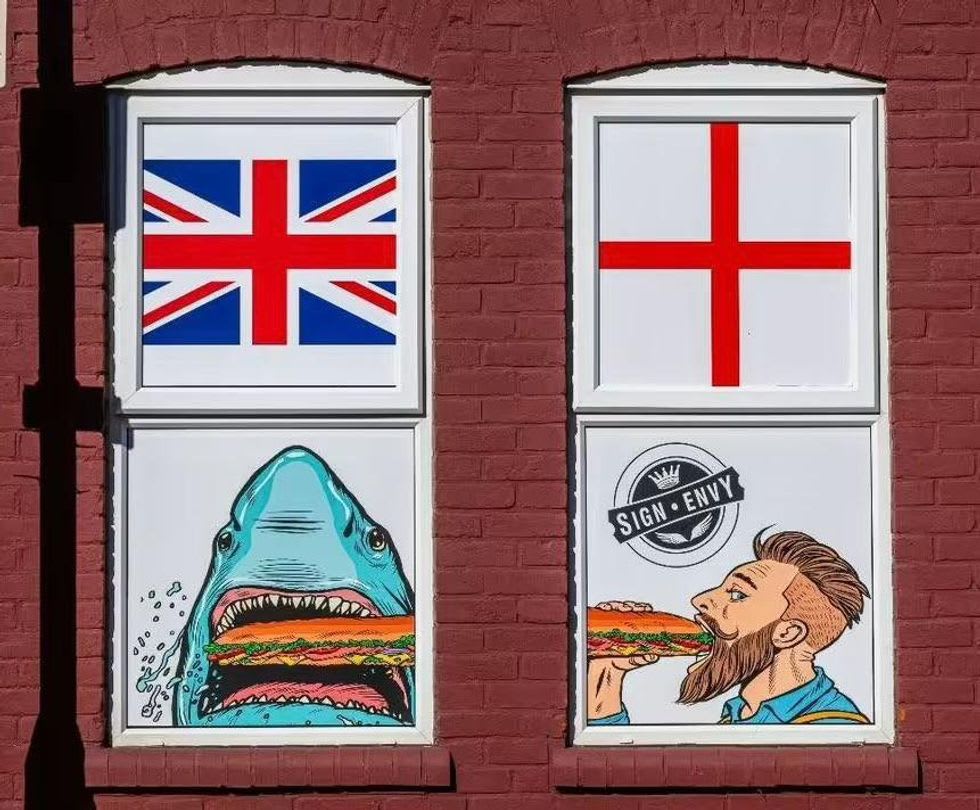 Shop allowed to keep Union Jack flag on window after council told them ...