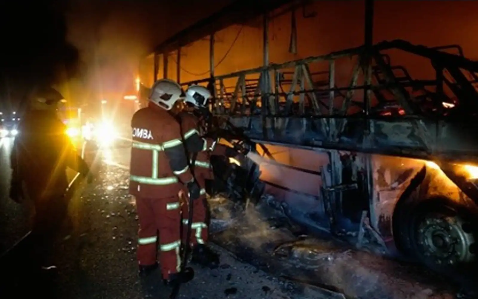 7 hurt as express bus catches fire after collision with lorry