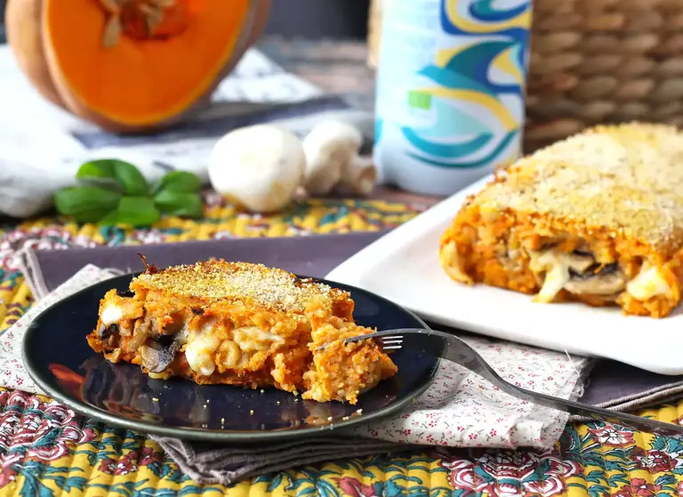 Vegetarian pumpkin "meatloaf" with mushrooms and stringy scamorza cheese