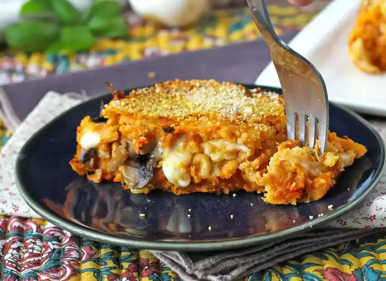 Vegetarian pumpkin "meatloaf" with mushrooms and stringy scamorza cheese