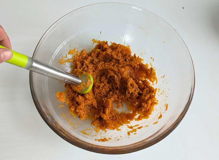 Vegetarian pumpkin meatloaf with mushrooms and stringy scamorza cheese