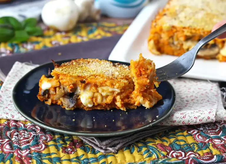 Vegetarian pumpkin "meatloaf" with mushrooms and stringy scamorza cheese