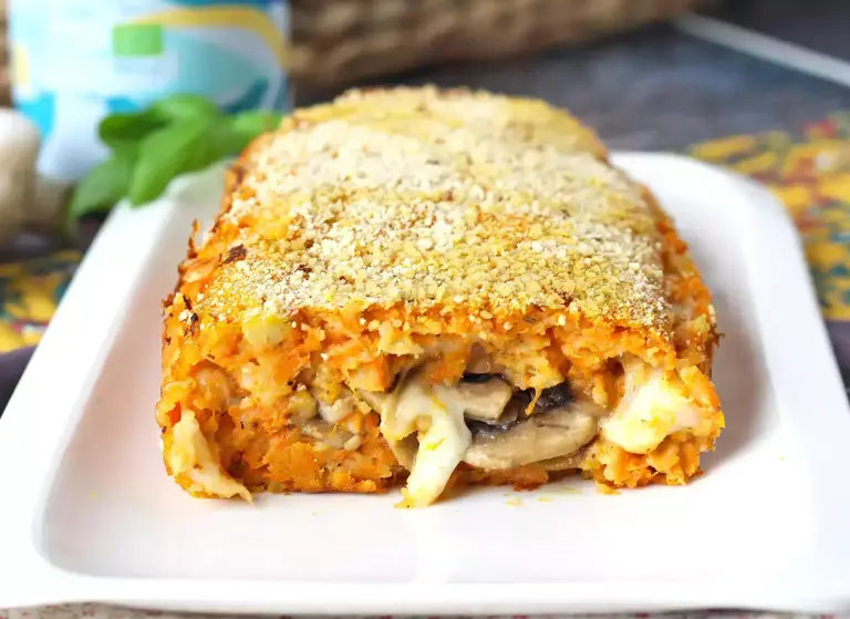 Vegetarian pumpkin "meatloaf" with mushrooms and stringy scamorza cheese