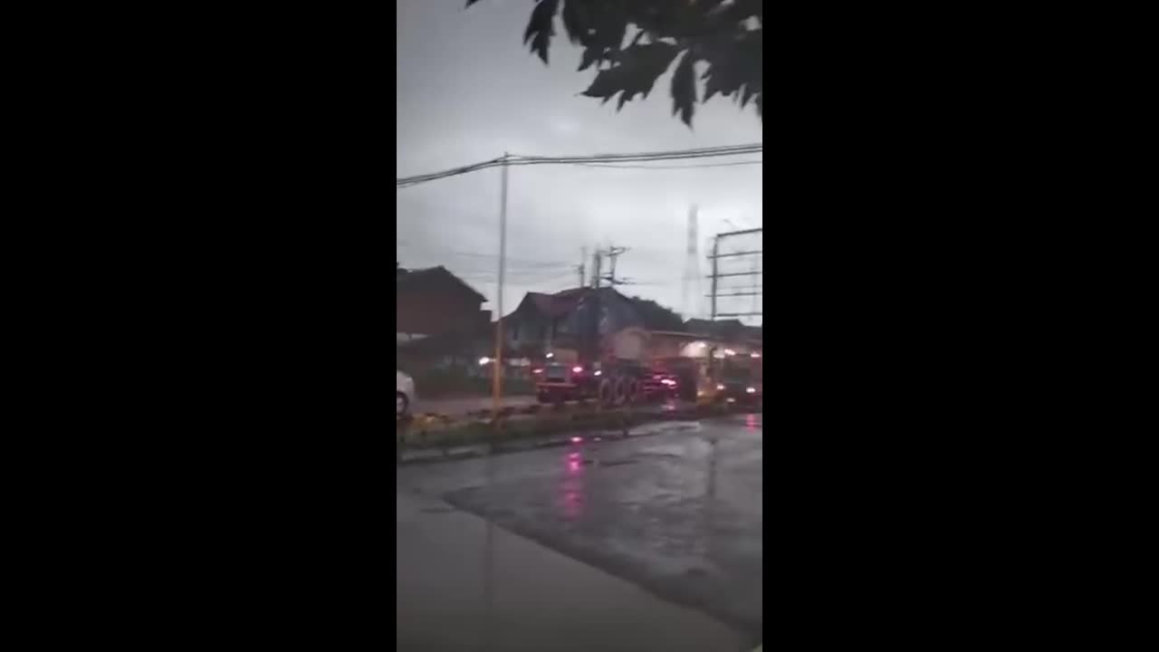 Train crashes into truck stuck on level crossing in Indonesia