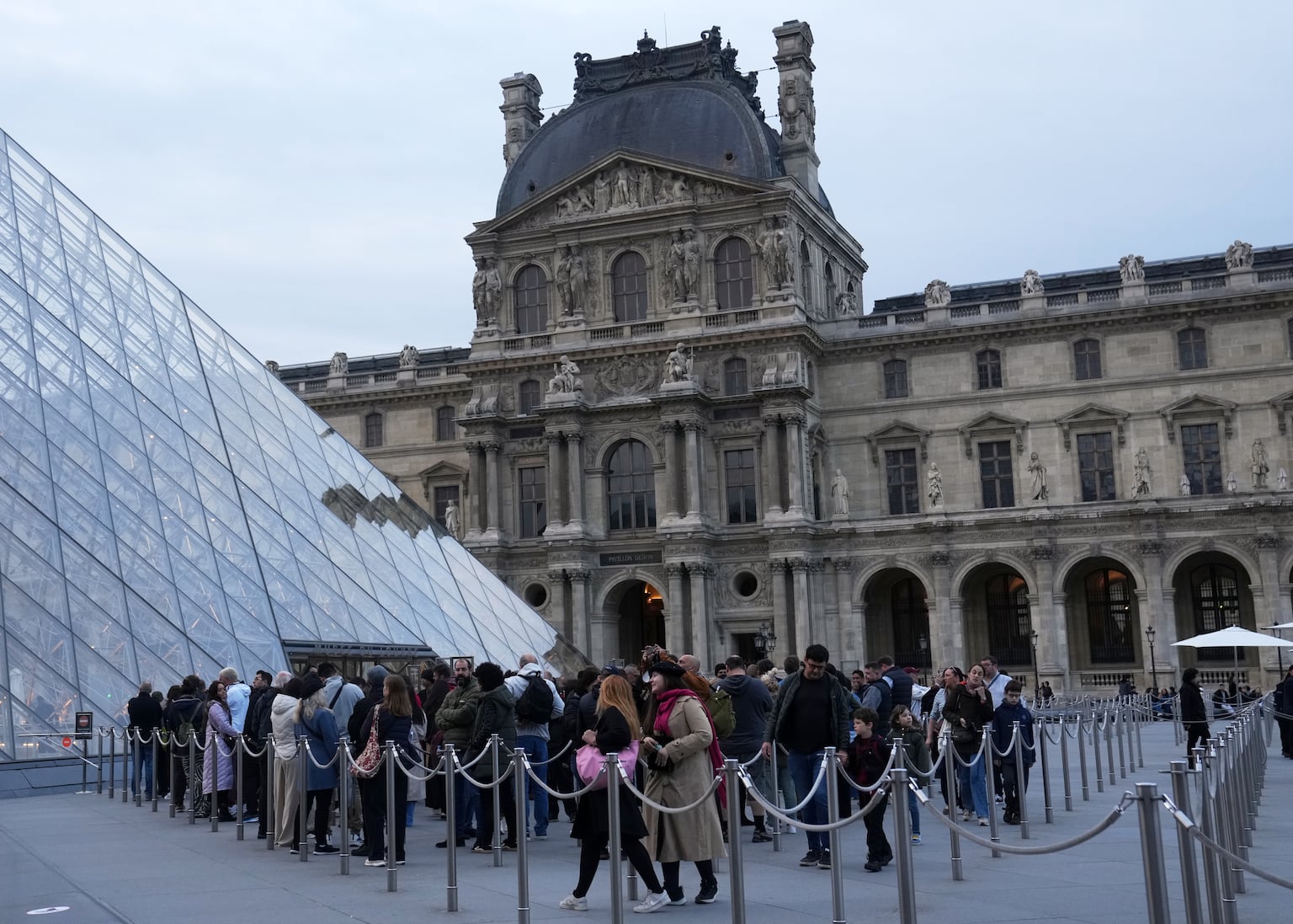 Louvre reopens three days after thieves stole French crown jewels