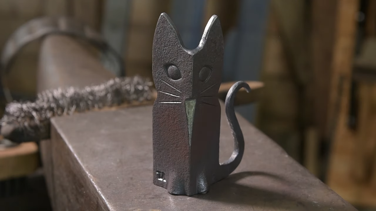 Blacksmith’s art – turning angle iron into a cat masterpiece