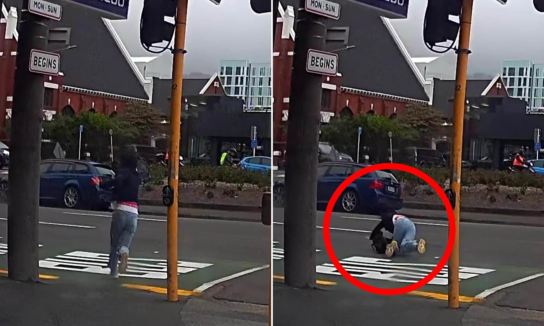 Frightening moment female pedestrian swept into traffic by a gust of ...