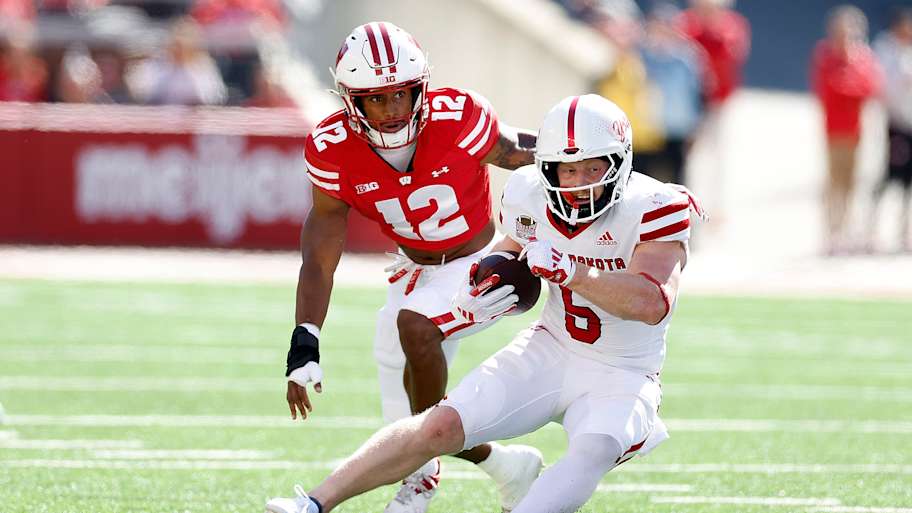 After successful heart surgery former Wisconsin DB is back on the sidelines