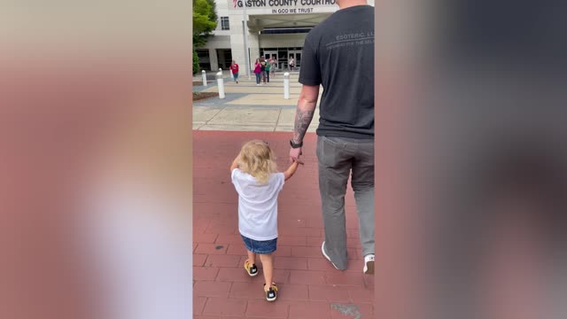Girl Receives Guard Of Honor With Roses On Adoption Day