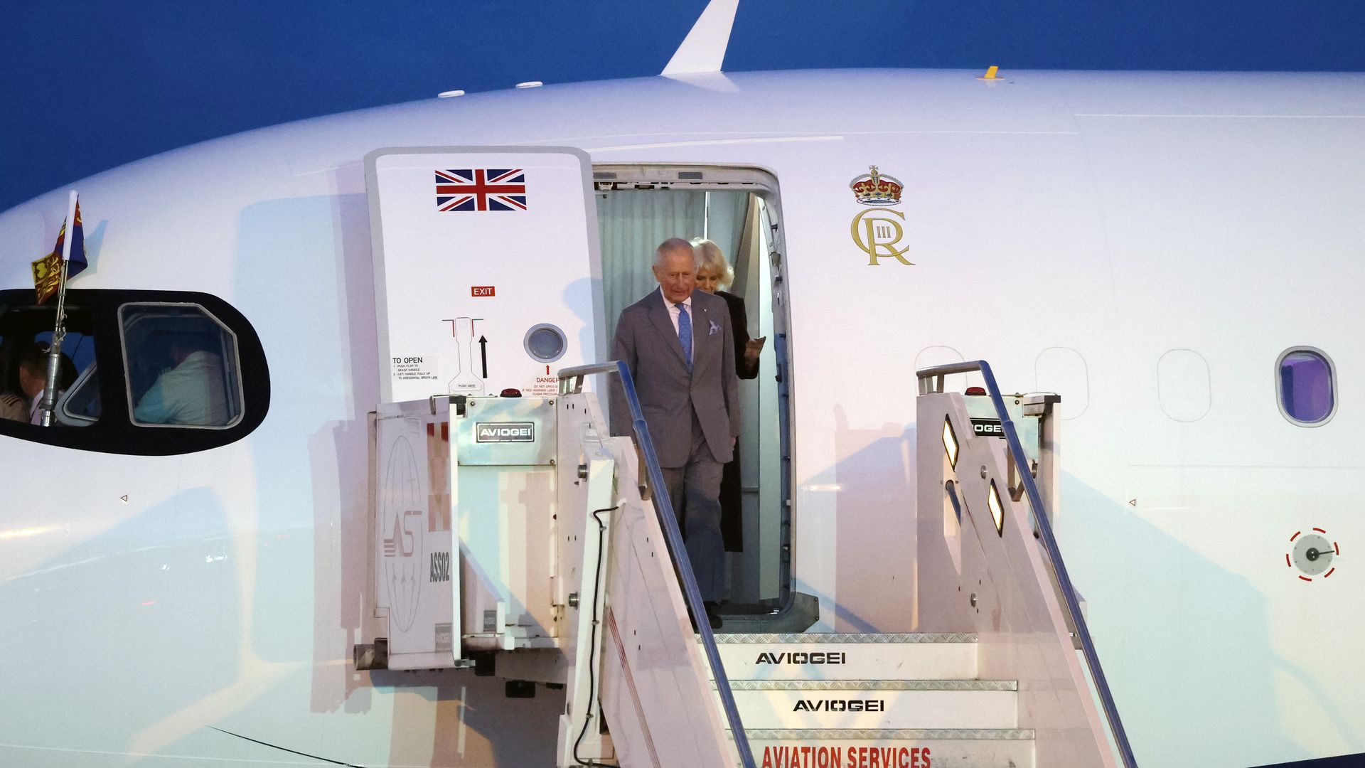 King Charles and Queen Camilla put on united front as they arrive in ...