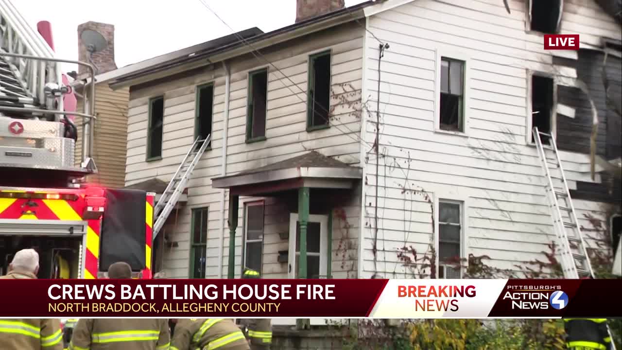 Smoke billows from residential duplex as crews battle 2-alarm fire in ...
