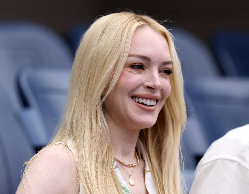 Fans Demand Lindsay Lohan’s ‘Secrets’ as She Stuns in 'Divine' White Gown