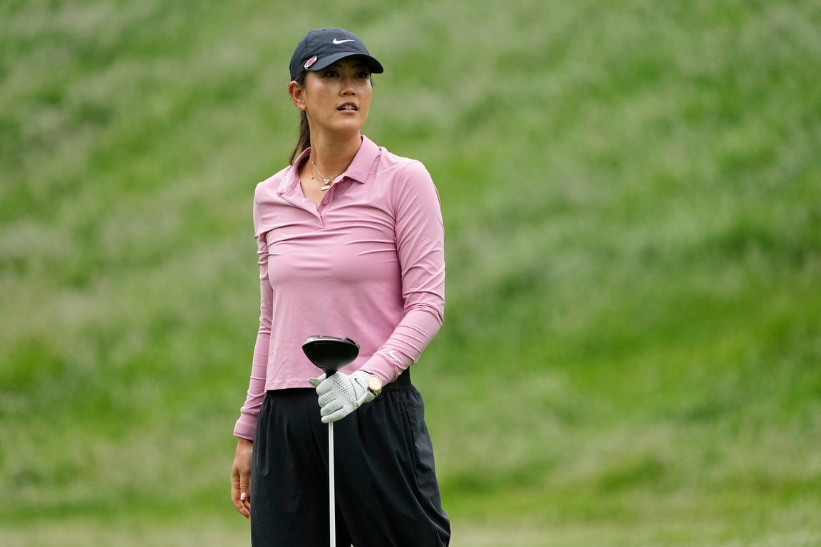 Standout photos illustrate the legendary golf career of Michelle Wie West