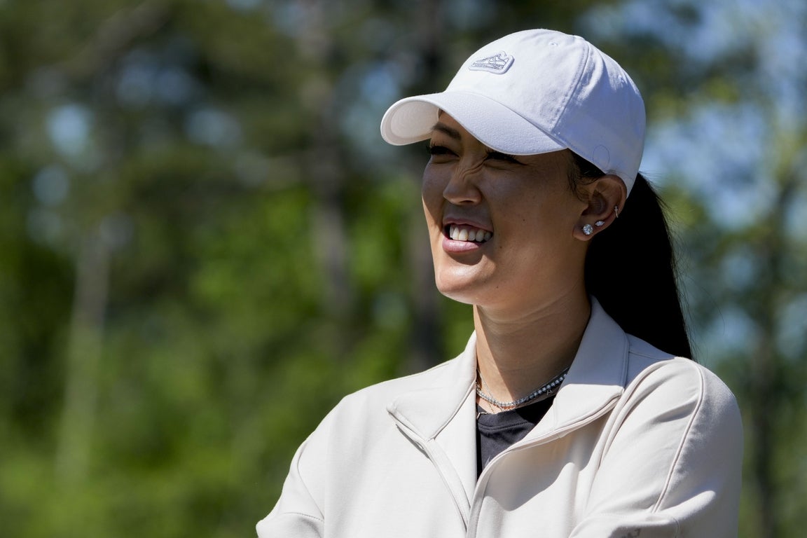 Standout photos illustrate the legendary golf career of Michelle Wie West