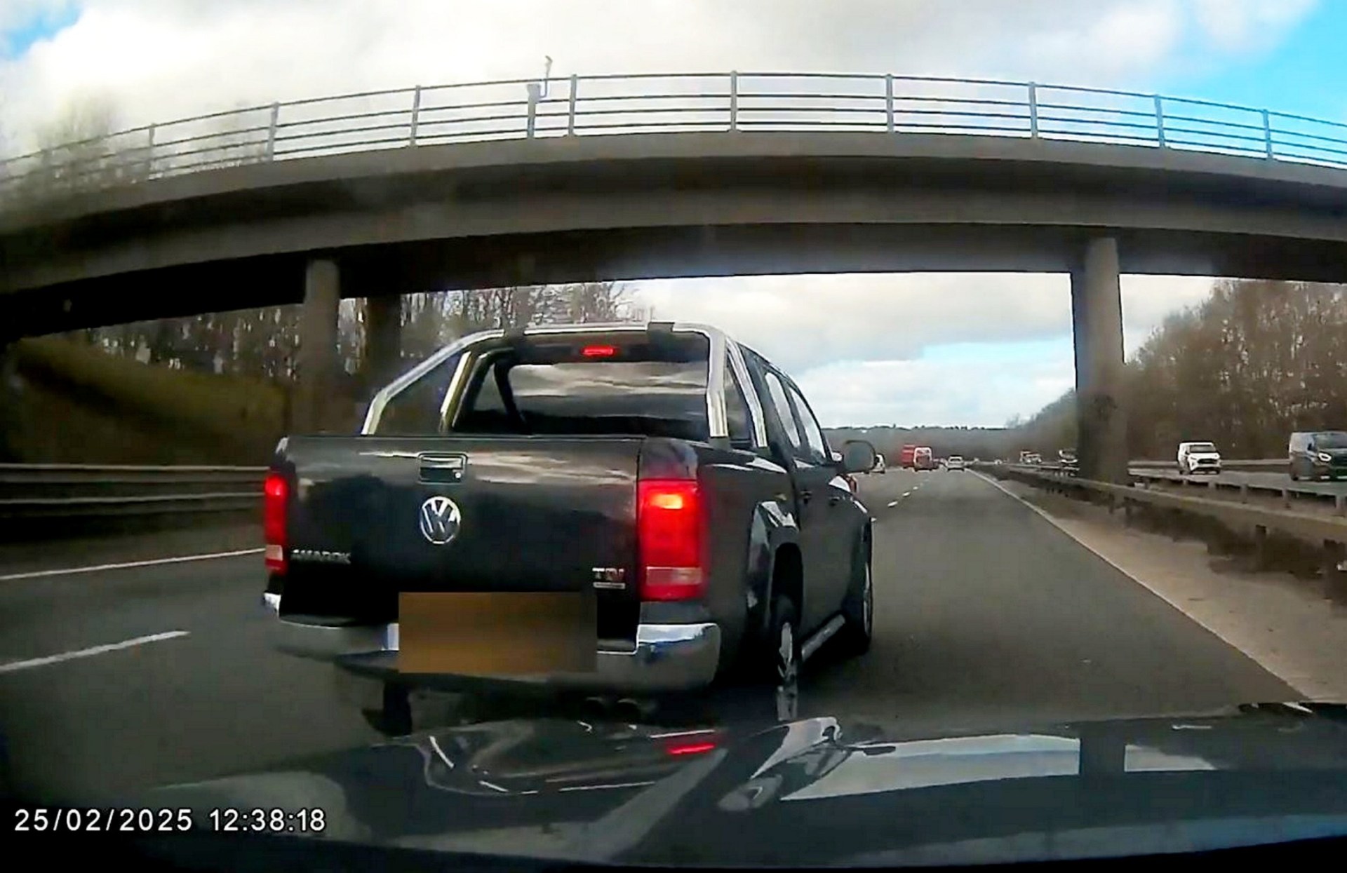 Raging driver brake checks on busy motorway