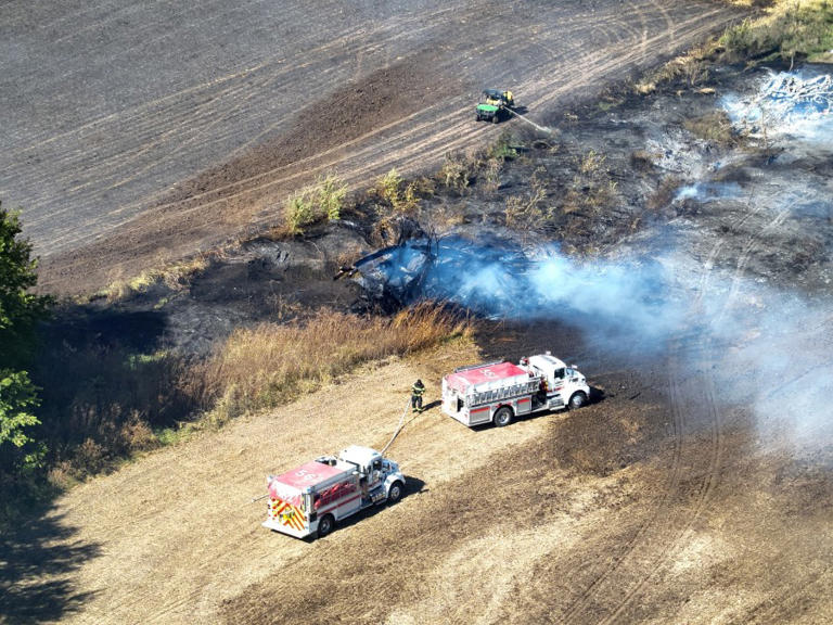 Multiple agencies battle large field fire in Pottawattamie County
