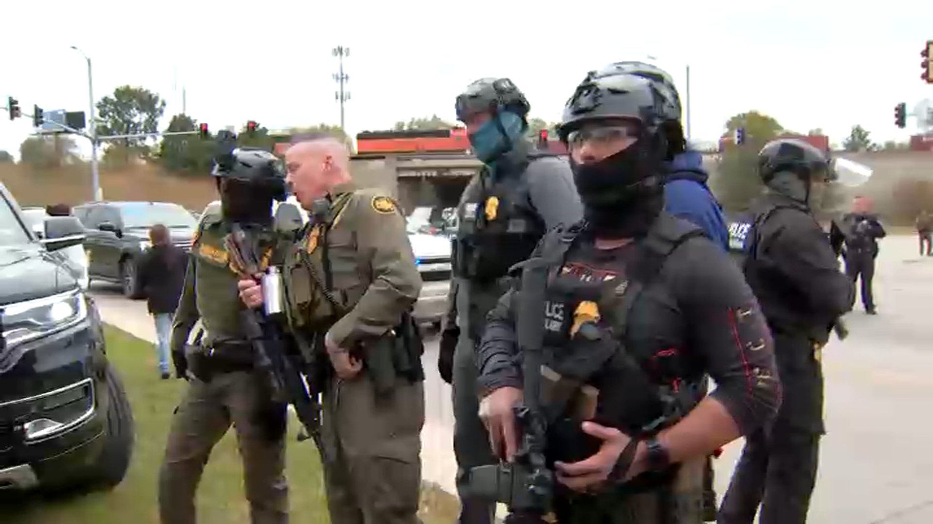 Car crashes and heavy federal agent presence spark protests in Chicago ...