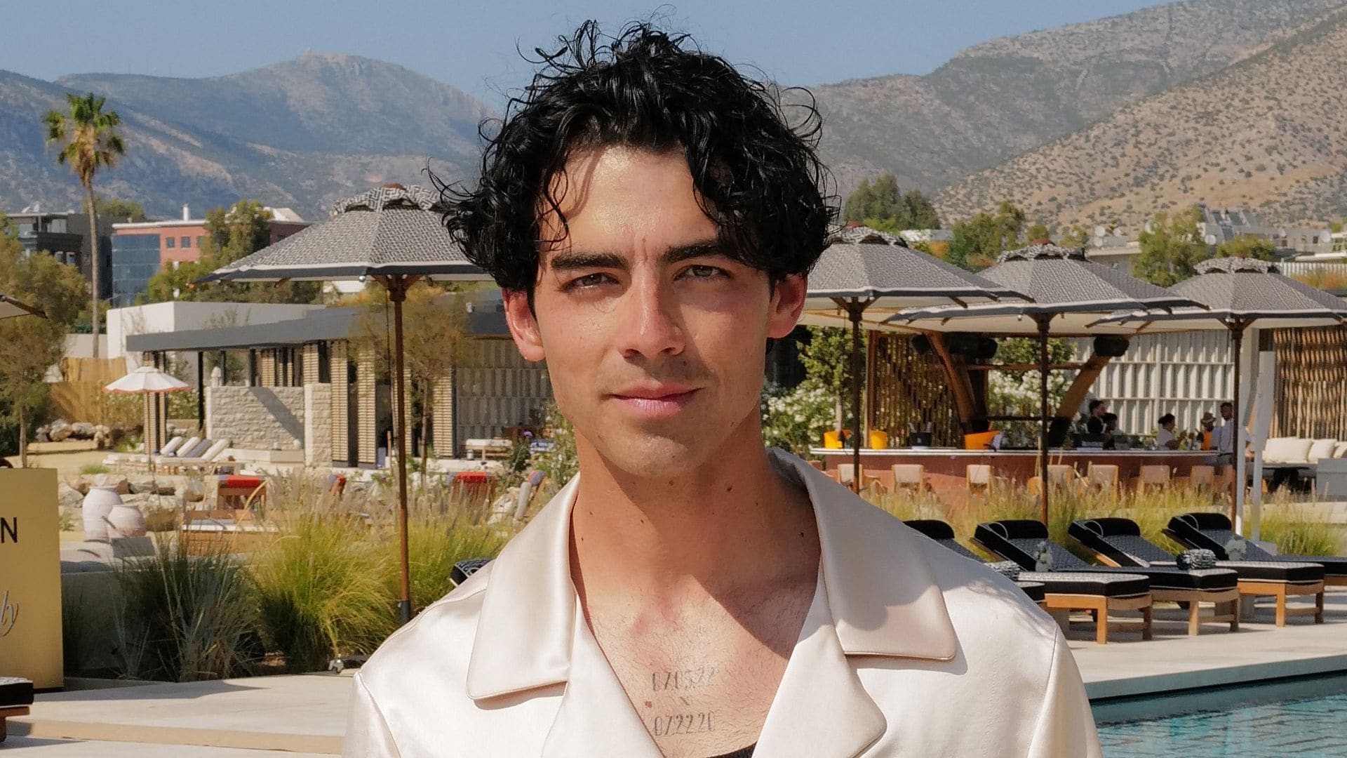 Joe Jonas shows off his six-pack on the beaches of Miami