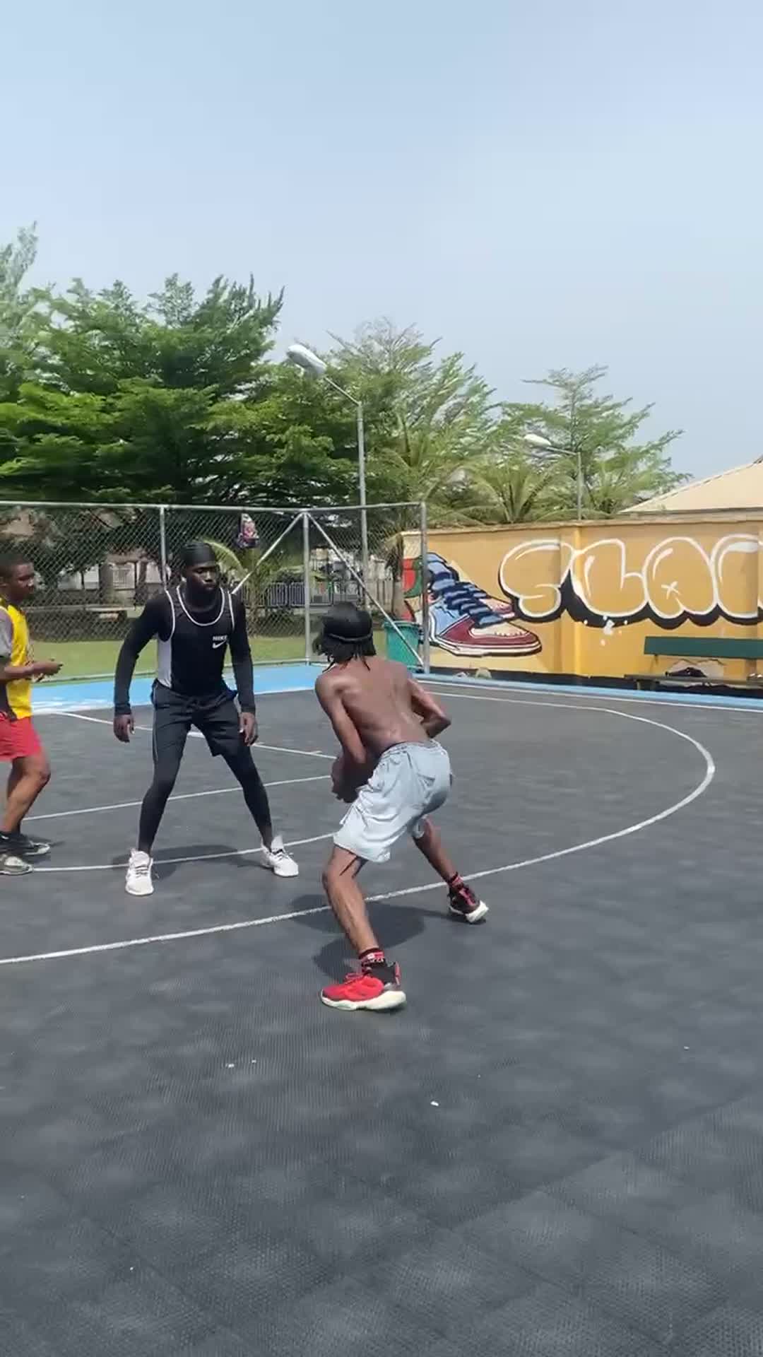 Outdoor Three On Three Basketball Game Intense Moments