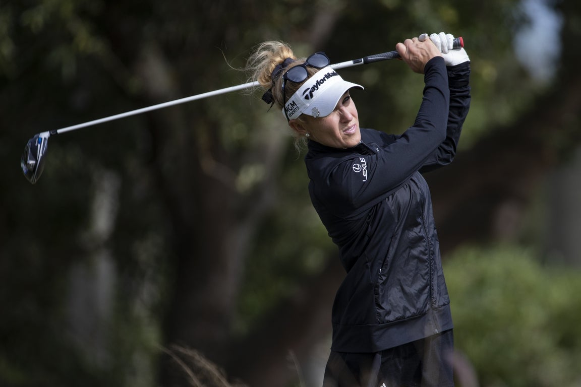 Natalie Gulbis, women’s golf standout and SI model, in can't miss photos