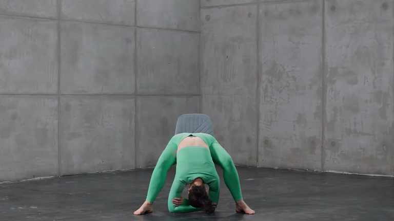 An expert shares three easy chair stretches to soothe back and shoulder ...