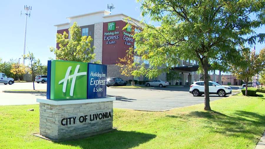 Docs: Ex-officer requested police after aiming gun at colleague