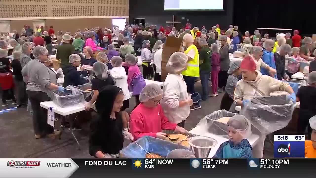 Green Bay-area students help pack meals for ‘Feed My Starving Children ...