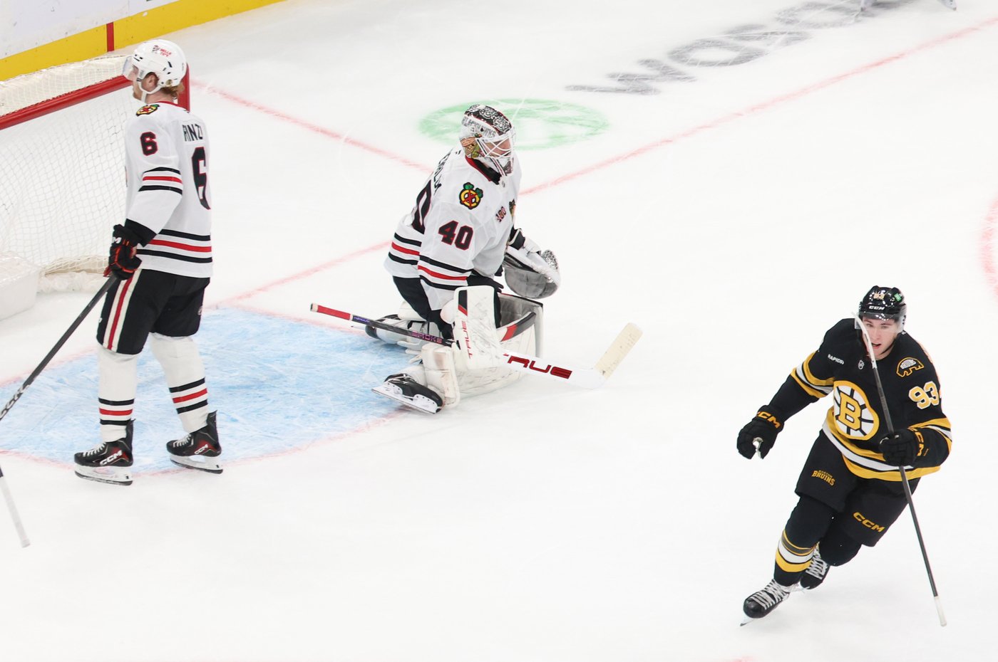 Fraser Minten scores in overtime to lift the Bruins past the Blackhawks ...