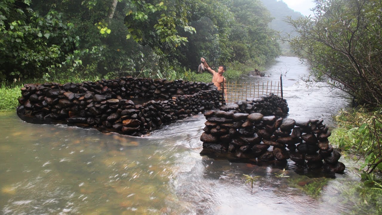 Primitive tech: making a stone dam