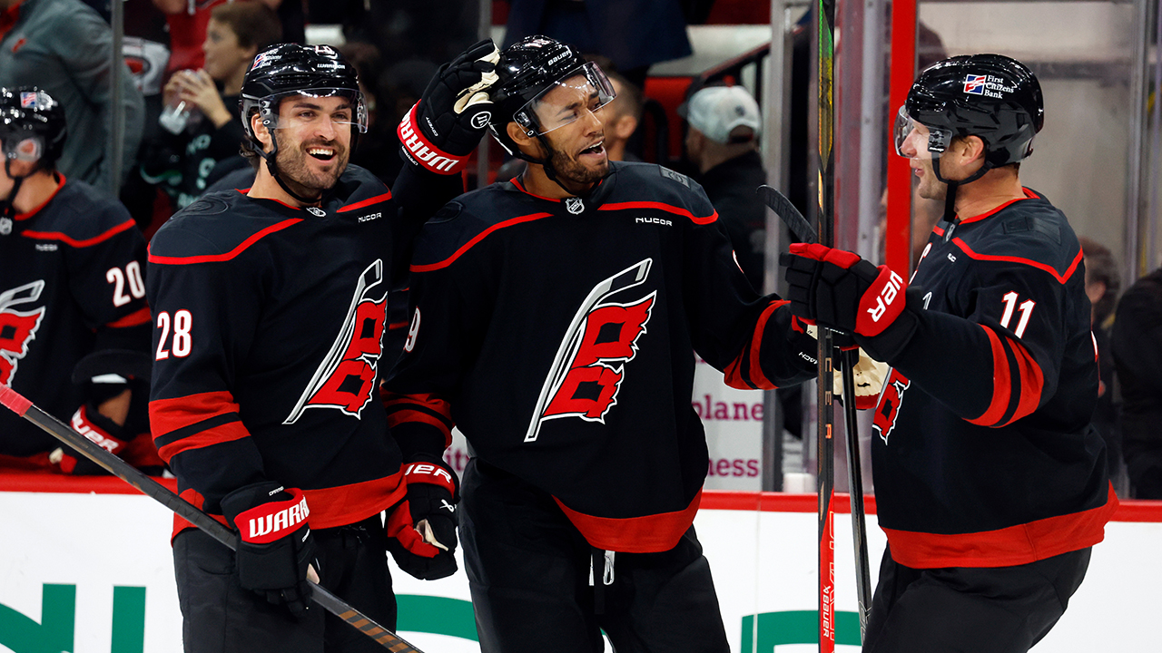 Canes erupt in final period to bury Devils 6-3 in season opener