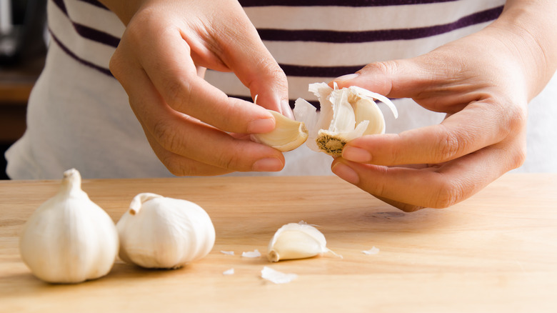 The 12 Absolute Best Uses For Your Garlic Press