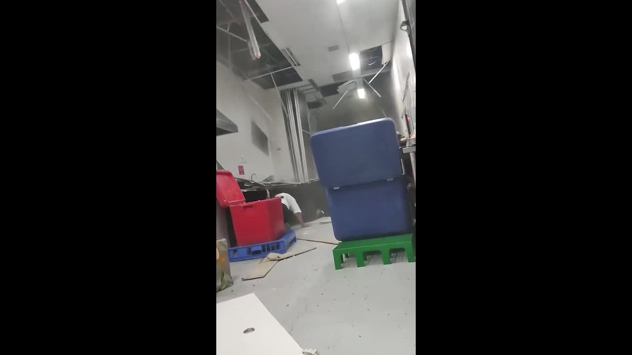 Philippines earthquake causes ceiling collapse as staff hide under tables