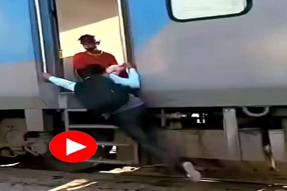 Video: Young man falls at a railway crossing while trying to board a ...