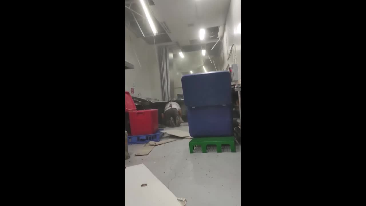 Philippines earthquake causes ceiling collapse as staff hide under tables